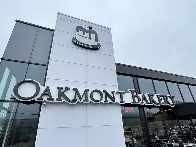 The sleek, modern exterior of Oakmont Bakery stands as a temple to carbohydrate worship, beckoning sweet-toothed pilgrims from across Pennsylvania.