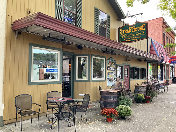 The cheerful yellow exterior of The Steak House in Wellsboro invites you in like a warm hug, complete with outdoor seating for people-watching between bites.