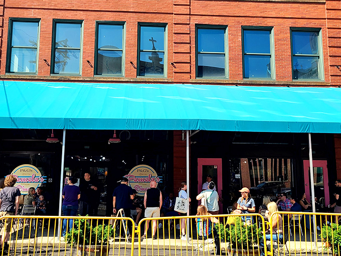The Strip District storefront beckons like a breakfast siren, promising crispy-edged hotcakes and omelet perfection within.