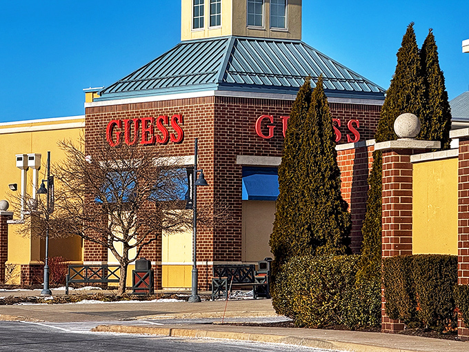 Surrounded by meticulously trimmed cypress trees, the GUESS outlet offers a touch of Mediterranean flair to your bargain-hunting adventure. 
