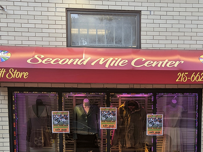 The iconic red awning of Second Mile Center beckons bargain hunters like a lighthouse for the thrifty. Philadelphia's treasure trove awaits behind those twinkling window displays.