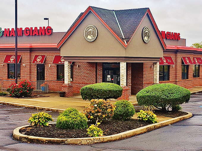 The red-and-green sign beckons like a culinary lighthouse in Northeast Philly. This unassuming brick building houses flavor treasures that rival any downtown hotspot.