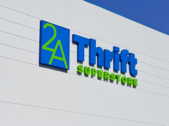 The iconic blue and green sign beckons bargain hunters like a lighthouse guiding ships to treasure-filled shores.