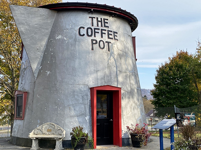 Standing tall and proud, The Coffee Pot's silver exterior gleams in the autumn light, beckoning travelers with its whimsical charm and unmistakable silhouette.