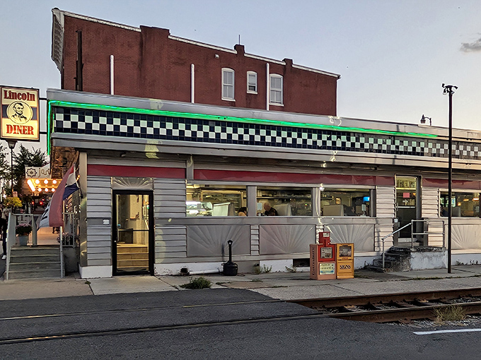 The iconic checkerboard trim and vintage signage of Lincoln Diner stands as a beacon of breakfast hope along Gettysburg's historic streets.