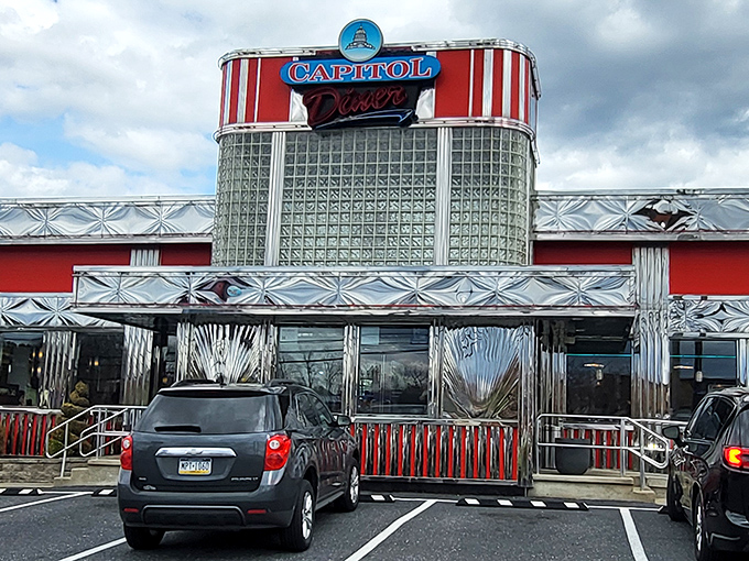 The gleaming stainless steel exterior of Capitol Diner stands as a beacon of breakfast hope, promising classic American comfort in architectural form.