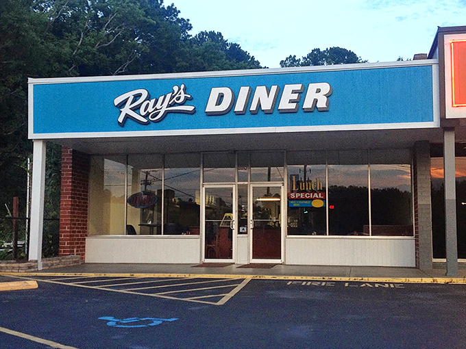 The blue sign beckons like an old friend. Ray's Diner stands unpretentiously on Two Notch Road, promising comfort without fanfare.