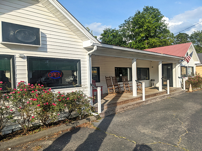 The unassuming exterior of Olde House Caf&eacute;, complete with rocking chairs on the porch, promises Southern comfort without the frills.