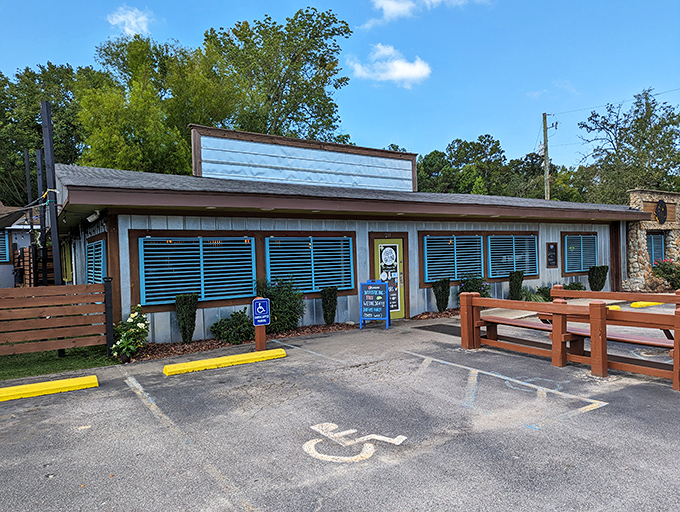 Blue window frames and wooden benches welcome hungry visitors, creating that "come as you are" vibe that's increasingly rare in our Instagram-perfect world.