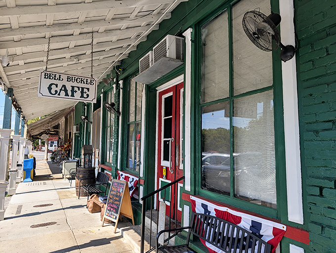The charming exterior of Bell Buckle Cafe welcomes you with small-town warmth and a colorful mural that's like a handshake in building form.