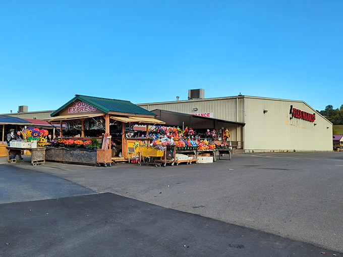 The Great Smokies Flea Market stands proud under Tennessee blue skies, like a cathedral of commerce where bargain hunters worship at the altar of "good finds."