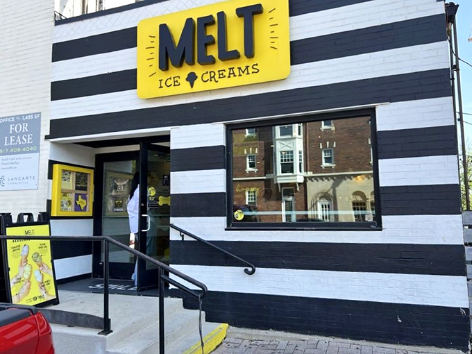 That unmistakable black and white striped facade promises serious ice cream business awaits inside this Fort Worth gem.