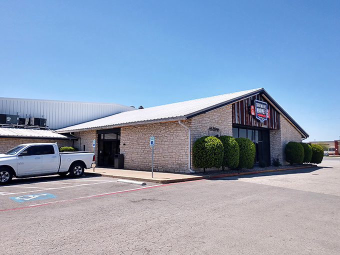 The limestone exterior of Southside Market stands like a barbecue fortress against the Texas sky, beckoning hungry pilgrims from miles around.