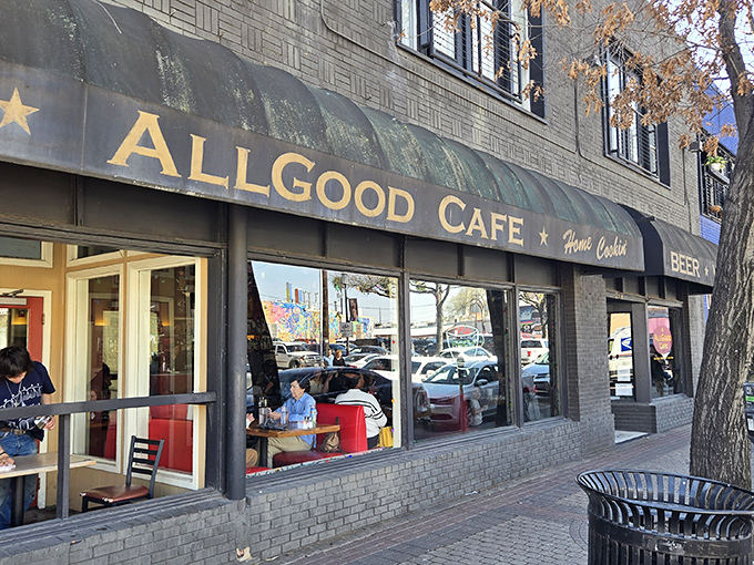 A classic black awning with gold lettering &ndash; like a humble Broadway marquee announcing the daily show of comfort food and community that unfolds inside.