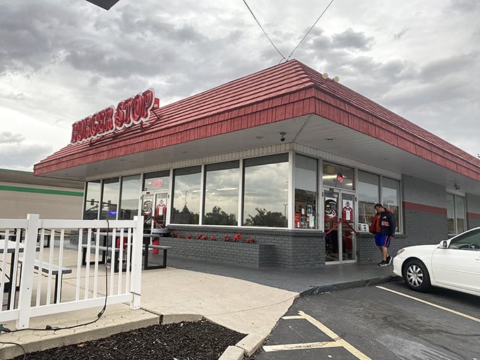 The iconic red roof of Burger Stop beckons like a lighthouse for the hungry, promising salvation from mediocre fast food in Layton.