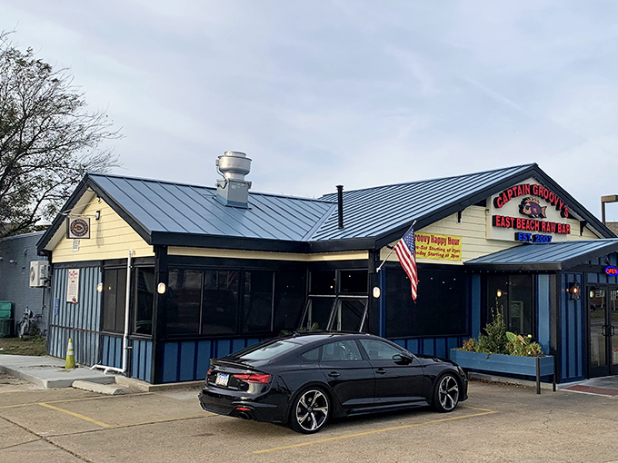 The restaurant's distinctive blue and cream facade catches the eye like a friendly coastal postcard come to life in suburban Norfolk.