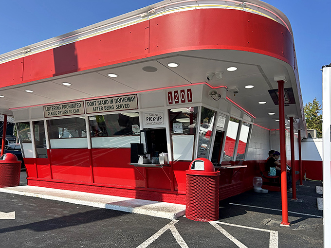 The iconic red and white Frisko Freeze stands like a time machine to the 1950s, beckoning hungry Tacoma residents with its retro charm.