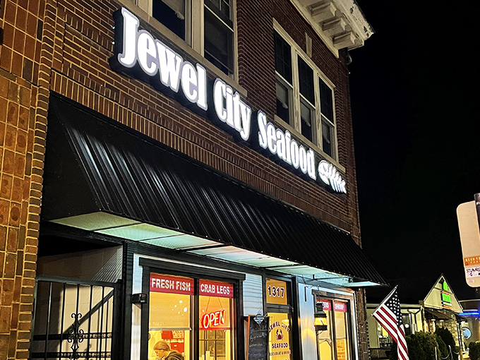 The glowing sign of Jewel City Seafood beckons like a lighthouse for hungry souls. No fancy frills, just the promise of ocean treasures in the heart of Huntington.