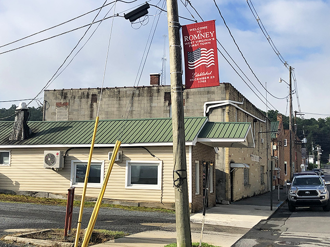 The unassuming exterior of Romney Diner stands like a culinary time capsule in West Virginia's oldest town. Green roof, simple siding, big flavors waiting inside. 
