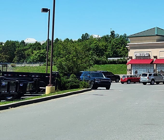 The red awning of Uptown Cheapskate beckons like a fashion lighthouse in a sea of retail options. Thrift shopping elevated.