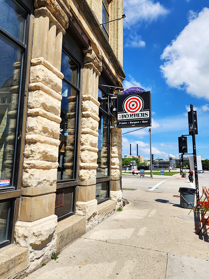 AJ Bombers' iconic cream city brick exterior stands proudly on Water Street, its bullseye sign promising the holy trinity of happiness: P-nuts, Burgers, and Beer.