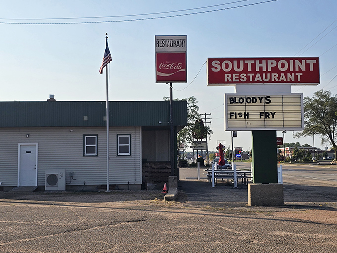 Old Glory waves proudly outside this unassuming culinary landmark where the Friday fish fry draws devotees from across central Wisconsin.