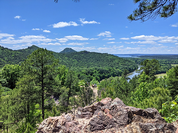 The view that makes you forget your burning calves. Arkansas's rolling hills and winding river create nature's perfect screensaver.