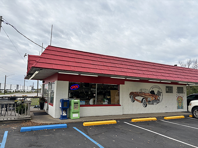 The classic red-roofed exterior of Rock-Cola 50's Caf&eacute; stands like a time portal on Brookville Road, complete with vintage car mural that practically begs you to pop the collar on your leather jacket.