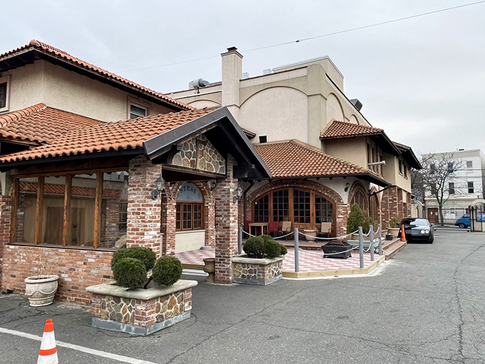 The architectural equivalent of a warm Portuguese hug, Fernandes Steak House II's exterior blends rustic charm with old-world elegance. Those terracotta roof tiles aren't just for show!