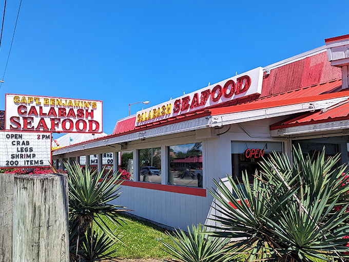 The iconic red signage of Captain Benjamin's promises seafood treasures within. Like a lighthouse for hungry sailors, it beckons with promises of crab legs and 200 delectable items.