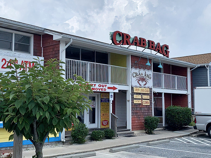 The red cedar-shingled exterior of The Crab Bag stands like a beacon for seafood pilgrims, promising treasures of the Chesapeake within.