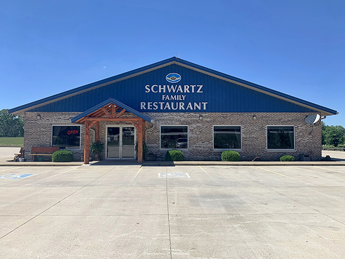 With its bright blue roof gleaming against Indiana&rsquo;s sky, Schwartz Family Restaurant stands as a comfort food sanctuary for road-weary travelers.