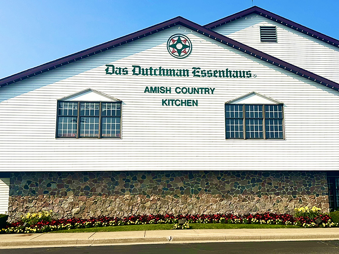 The iconic white exterior of Das Dutchman Essenhaus stands like a beacon of comfort food in Middlebury, promising culinary traditions that have survived the digital age.