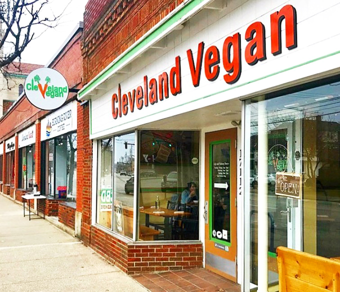 The bright red lettering against white brick practically screams "Come in and be converted!" Cleveland Vegan's welcoming storefront is a beacon for the plant-curious.