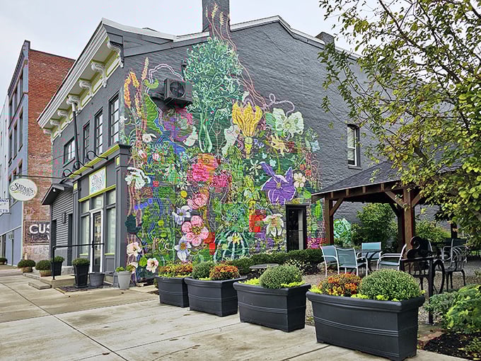 That mural isn't just art—it's a preview of the flavor explosion waiting inside Sarah's on Main. Wheeling's culinary canvas comes alive on this historic building's wall.