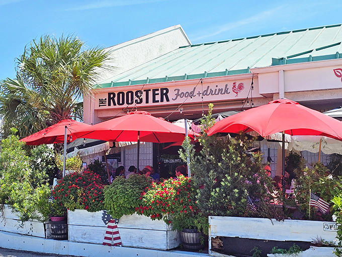 That cheerful patio with its colorful umbrellas is basically screaming "sit down and stay awhile, friend."