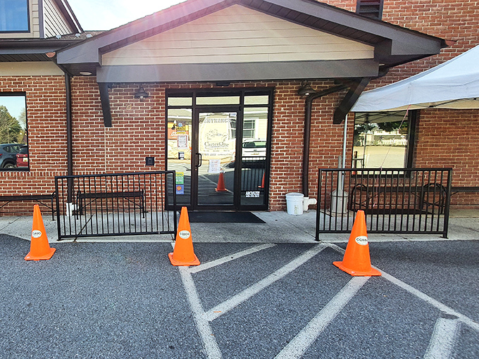 The unassuming entrance to barbecue paradise. Those orange cones aren't directing traffic&mdash;they're guiding hungry souls to smoked meat nirvana.