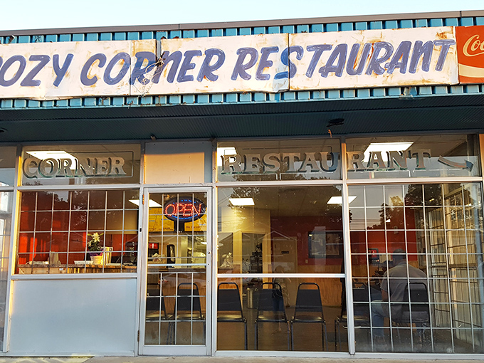 The unassuming storefront of Cozy Corner Restaurant might not scream "BBQ legend," but that neon "OPEN" sign is your gateway to Memphis flavor paradise.