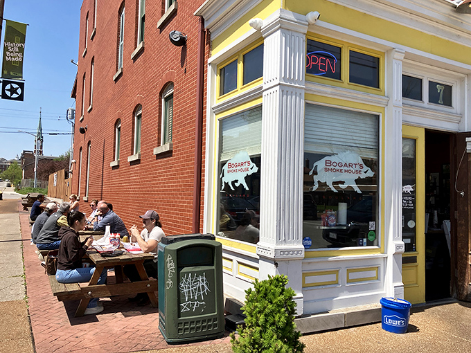 The bright yellow corner building of Bogart's Smokehouse stands like a beacon of barbecue hope in St. Louis' historic Soulard neighborhood, complete with outdoor seating for the patient pilgrims.