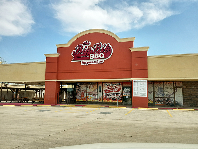 The Big Bib's bold red facade isn't just a building—it's a beacon of barbecue hope on the Texas landscape. Like finding an oasis when your stomach's running on empty.