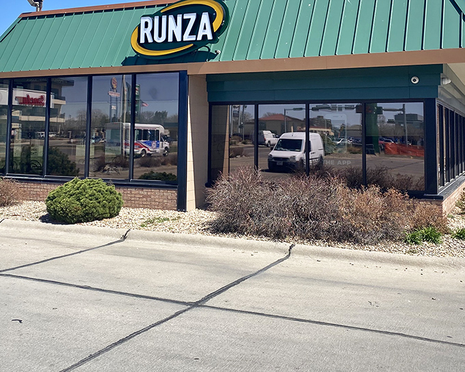 The iconic green roof of Runza beckons like a lighthouse for hungry travelers crossing Nebraska's vast plains. Comfort food paradise awaits inside.