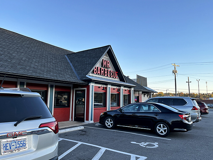 The red-trimmed exterior of Mr. Barbecue stands like a beacon of hope for hungry travelers &ndash; a temple of smoke where barbecue dreams come true.