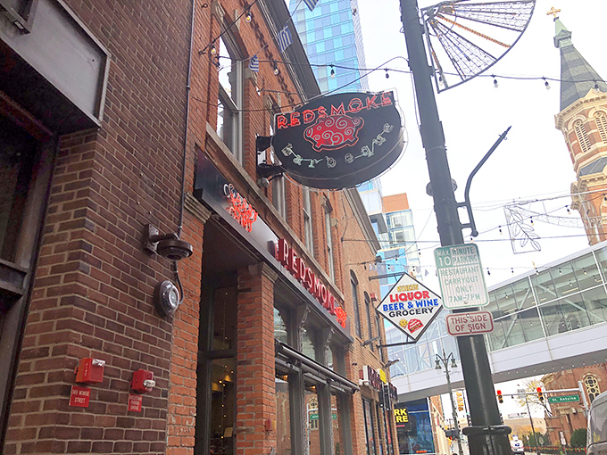 Detroit's skyline peeks through as Redsmoke's vintage-modern exterior beckons hungry visitors with its unmistakable pig logo &ndash; a sign that serious BBQ awaits inside.