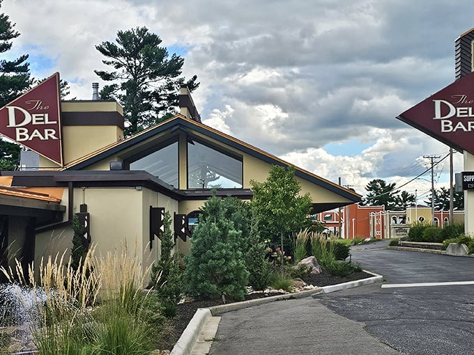 The Prairie-style architecture of The Del-Bar stands as a beacon for hungry travelers, promising mid-century charm and sizzling steaks within those angular walls.