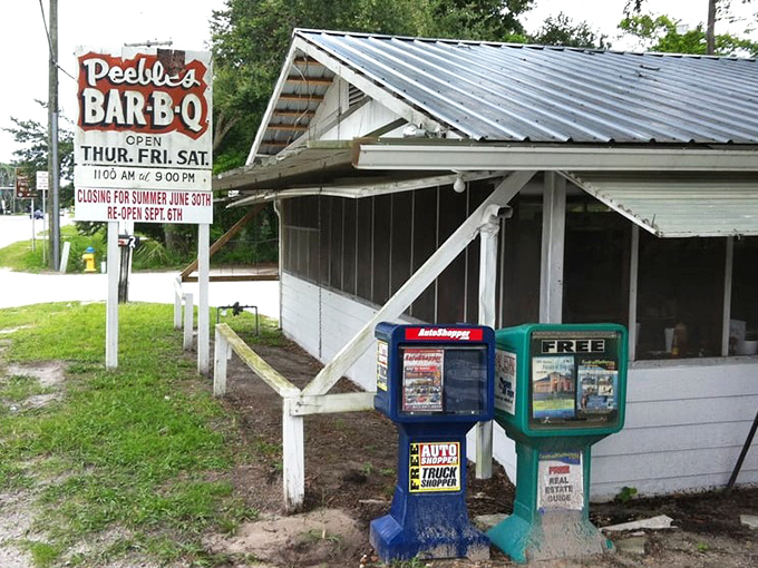 The unassuming roadside sign says it all - Peebles Bar-B-Q doesn't need fancy frills when the smoke signals speak volumes.