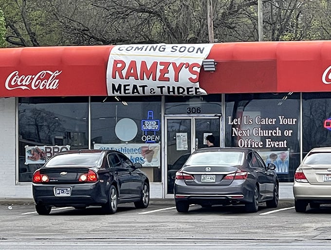That iconic red Coca-Cola awning with "COMING SOON" banner – Nashville's version of "once upon a time" for comfort food fairy tales.