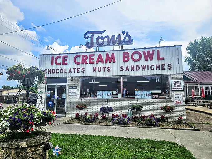 The unassuming white brick fa&ccedil;ade of Tom's Ice Cream Bowl stands as a beacon to ice cream pilgrims. This isn't architecture&mdash;it's a promise of deliciousness inside.