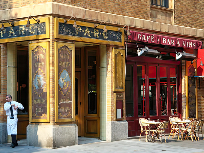The iconic corner entrance of Parc, where Philly meets Paris. Those yellow awnings and rattan chairs aren't just decoration&mdash;they're time machines to the Champs-&Eacute;lys&eacute;es.