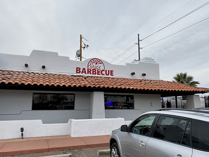 The unassuming adobe-style exterior of Eric's Family Barbecue stands like a smoke-scented mirage in Avondale, promising meaty treasures within those white walls.