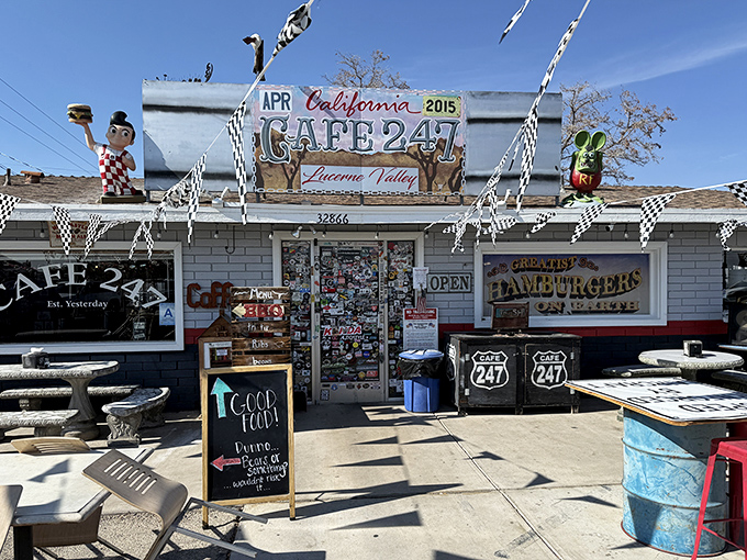 The desert mirage you actually want to find! Cafe 247's exterior promises roadside charm with checkered flags and quirky signage that screams "adventure awaits inside."